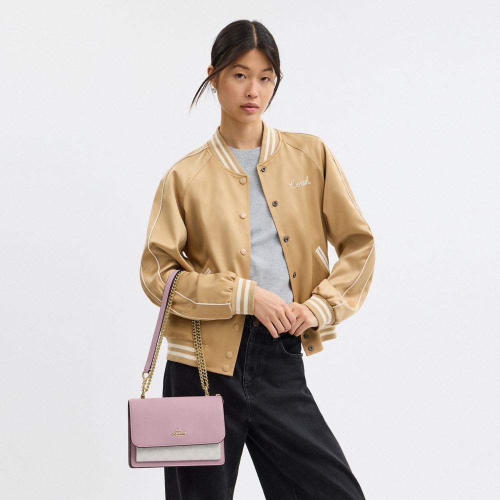 Coach – Conhecer o Americano